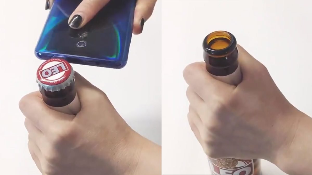 Xiaomi showcases Redmi K20 Pro pop-up lens camera by opening a beer bottle